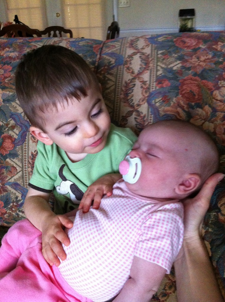 Cousin Nathan holds Baby Kayli – Philip, Leslie & Kayli